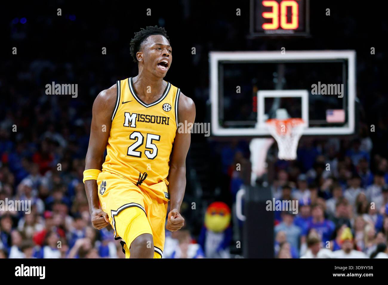 Missouri forward Mark Mitchell (25) reacts after scoring a 3-point ...