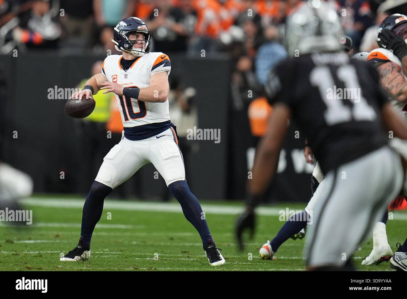 Denver Broncos quarterback Bo Nix (10) passes against the Las Vegas ...
