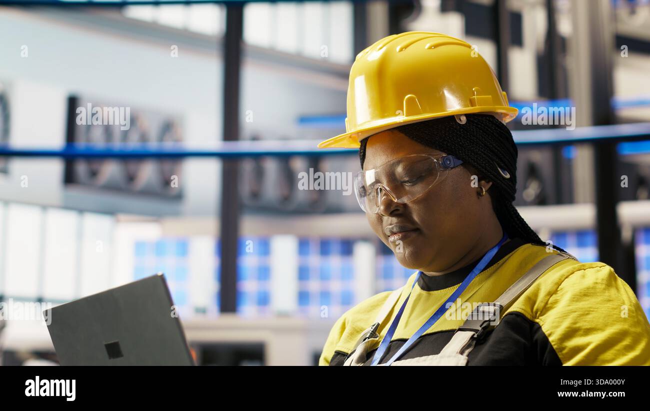 Smart factory specialist typing hi-res stock photography and images - Alamy
