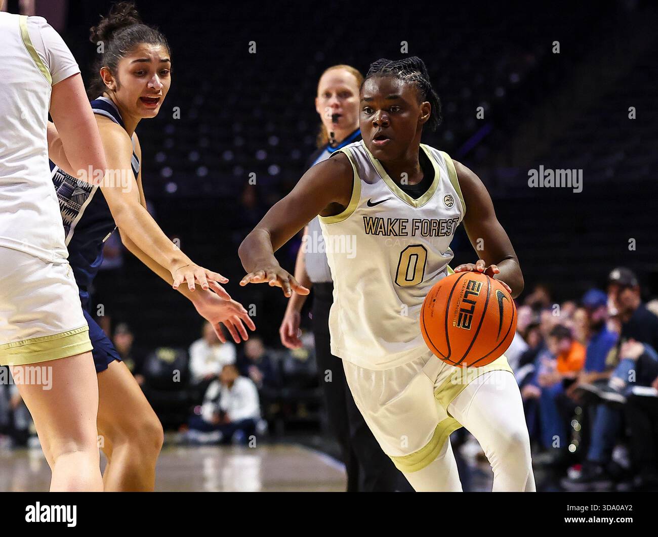 December 7, 2025: Wake Forest Guard Milan Brown (0) drives to basket ...