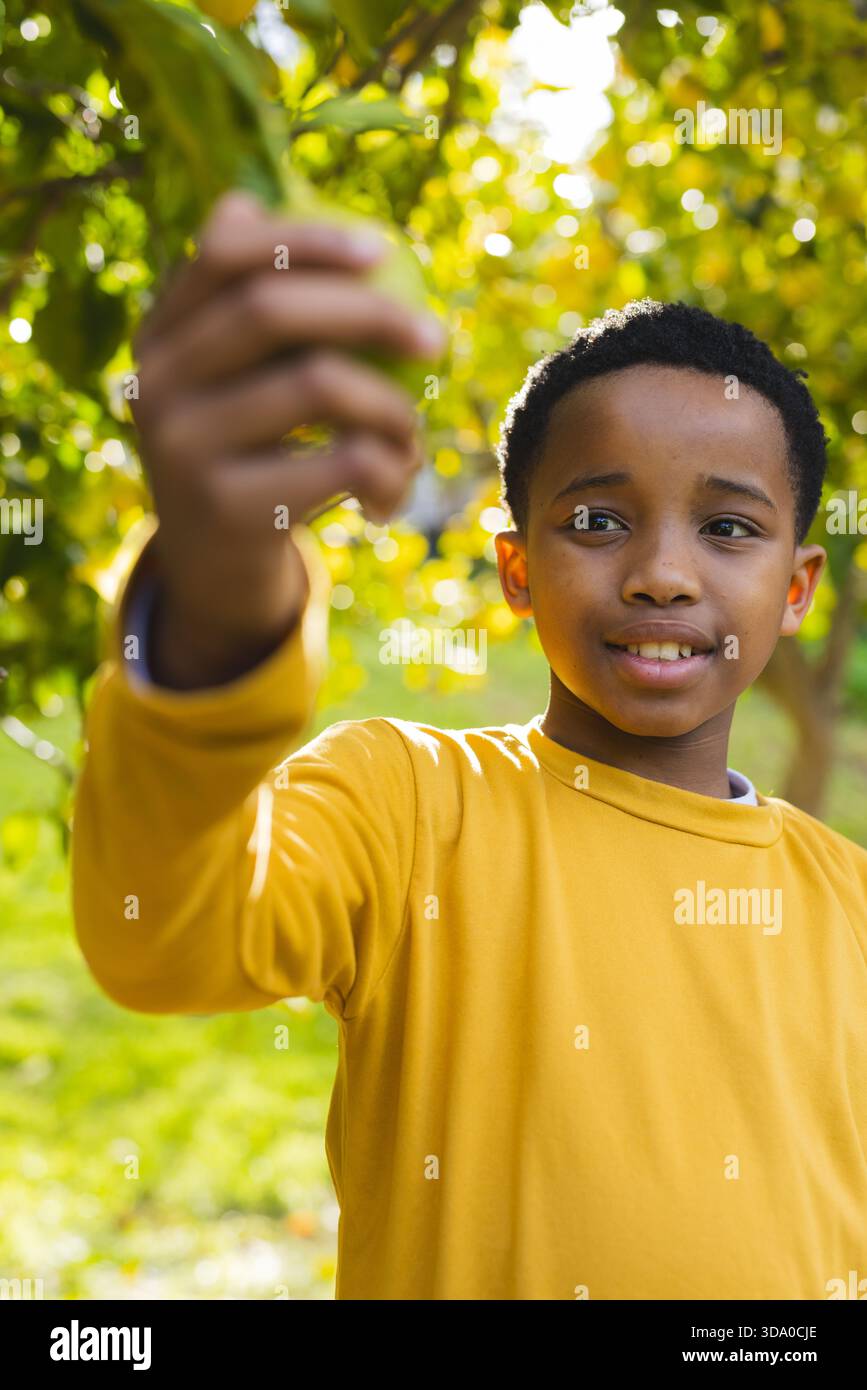 Child wearing yellow shirt hi-res stock photography and images - Alamy