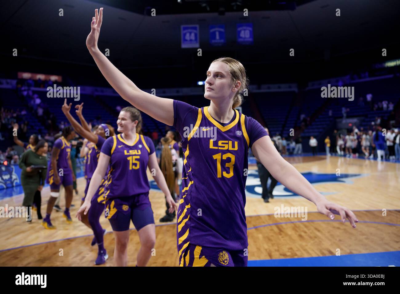 LSU forward Kate Koval (13) waves at the end of an NCAA college ...