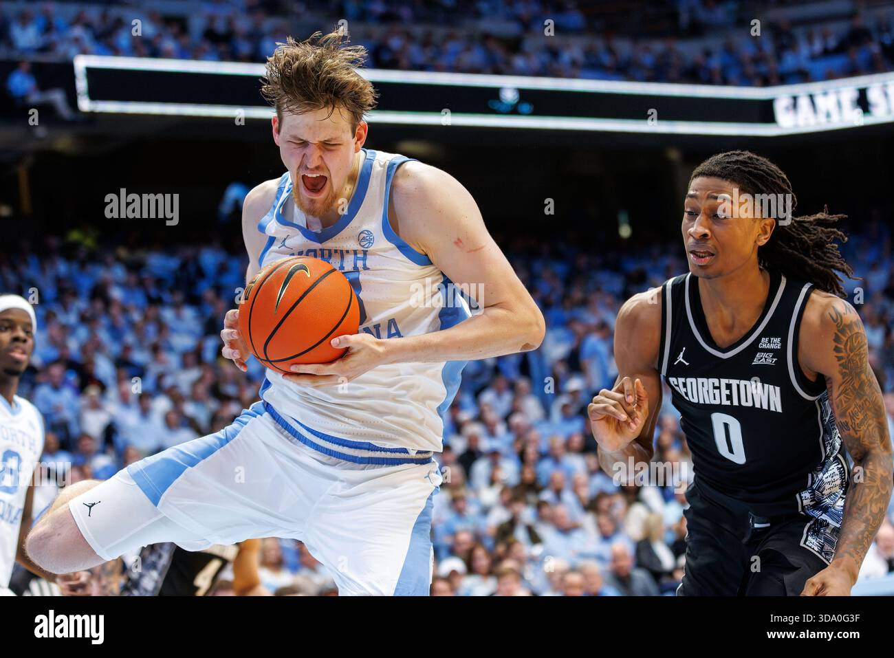 North Carolina's Henri Veesaar, front left, grabs a rebound ahead of ...