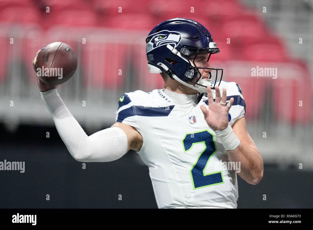 Seattle Seahawks quarterback Drew Lock warms up before an NFL football ...