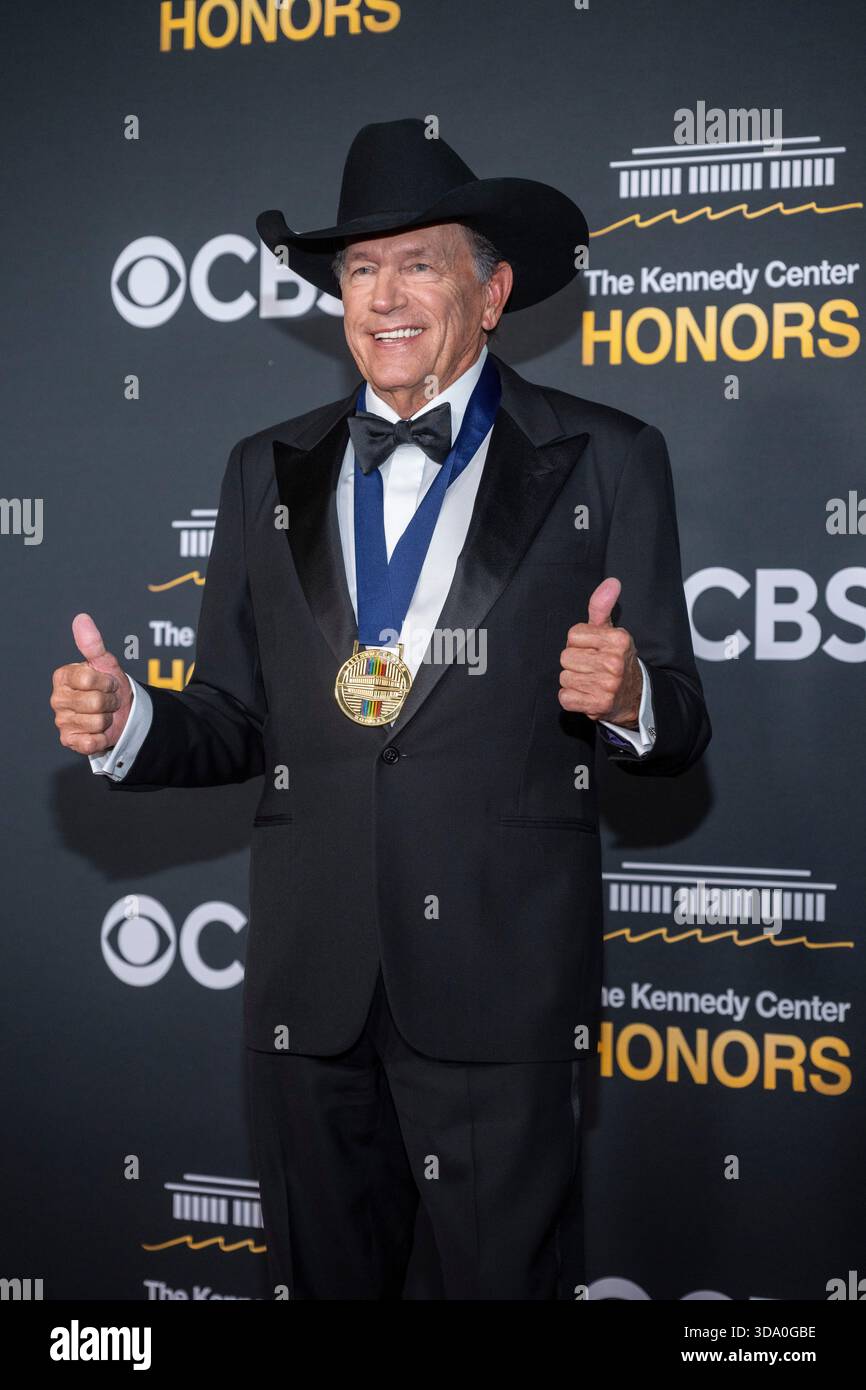 2025 Kennedy Center Honoree George Strait arrives on the red carpet for the 48th Kennedy Center ...
