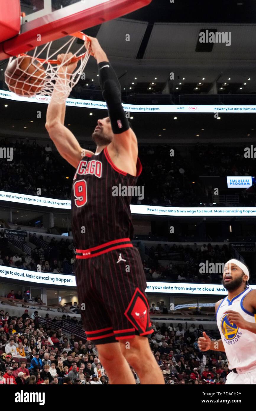 Chicago Bulls center Nikola Vucevic (9) dunks against the Golden State ...