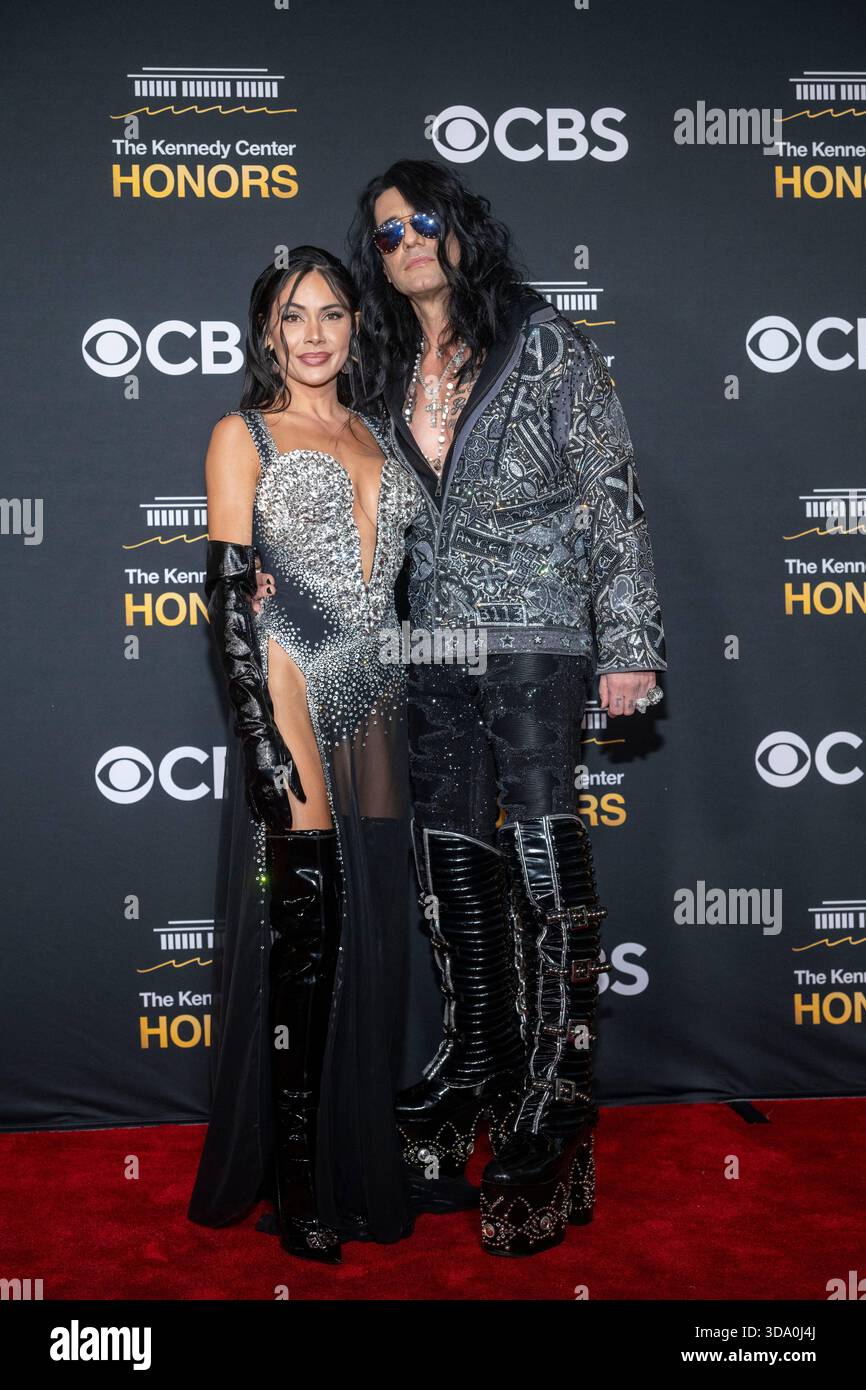 Criss Angel and Shaunyl Benson arrive on the red carpet for the 48th ...
