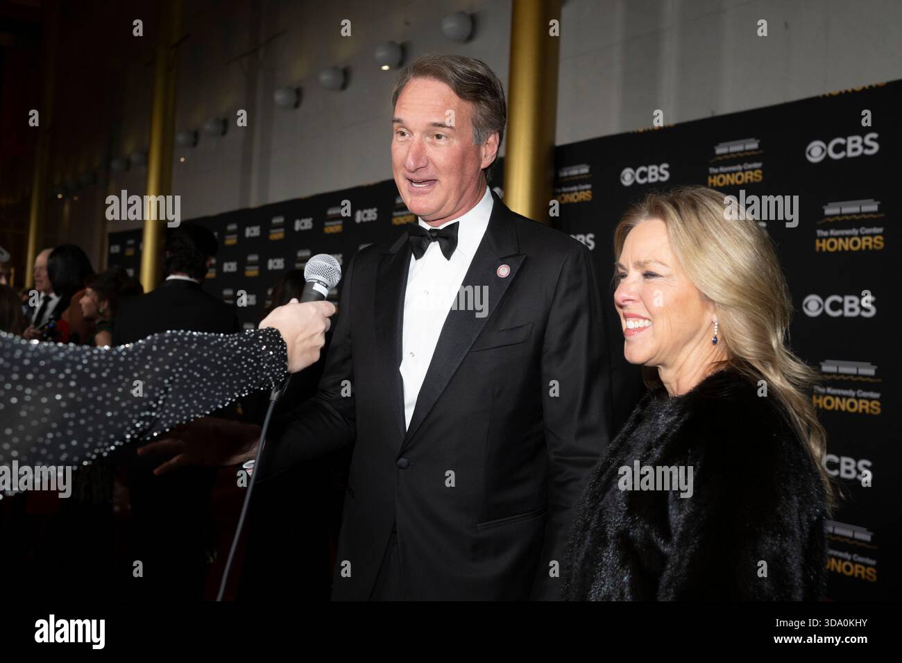 Governor of Virginia Glenn Younkin and his wife Suzanne Youngkin attend ...
