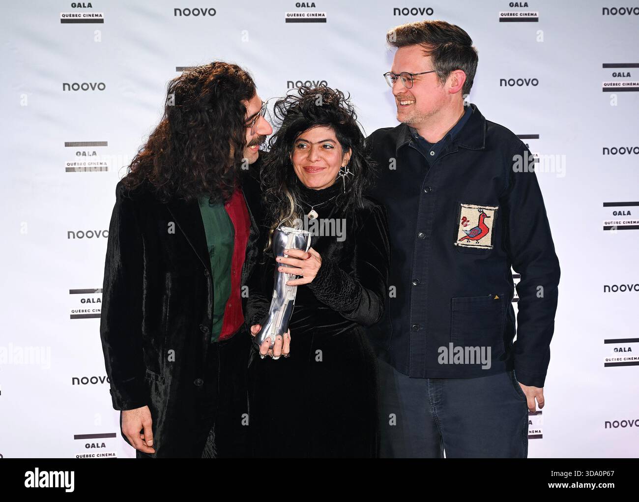 Pirouz Nemati, Ila Firouzabadi, and Matthew Rankin, from left, hold up ...