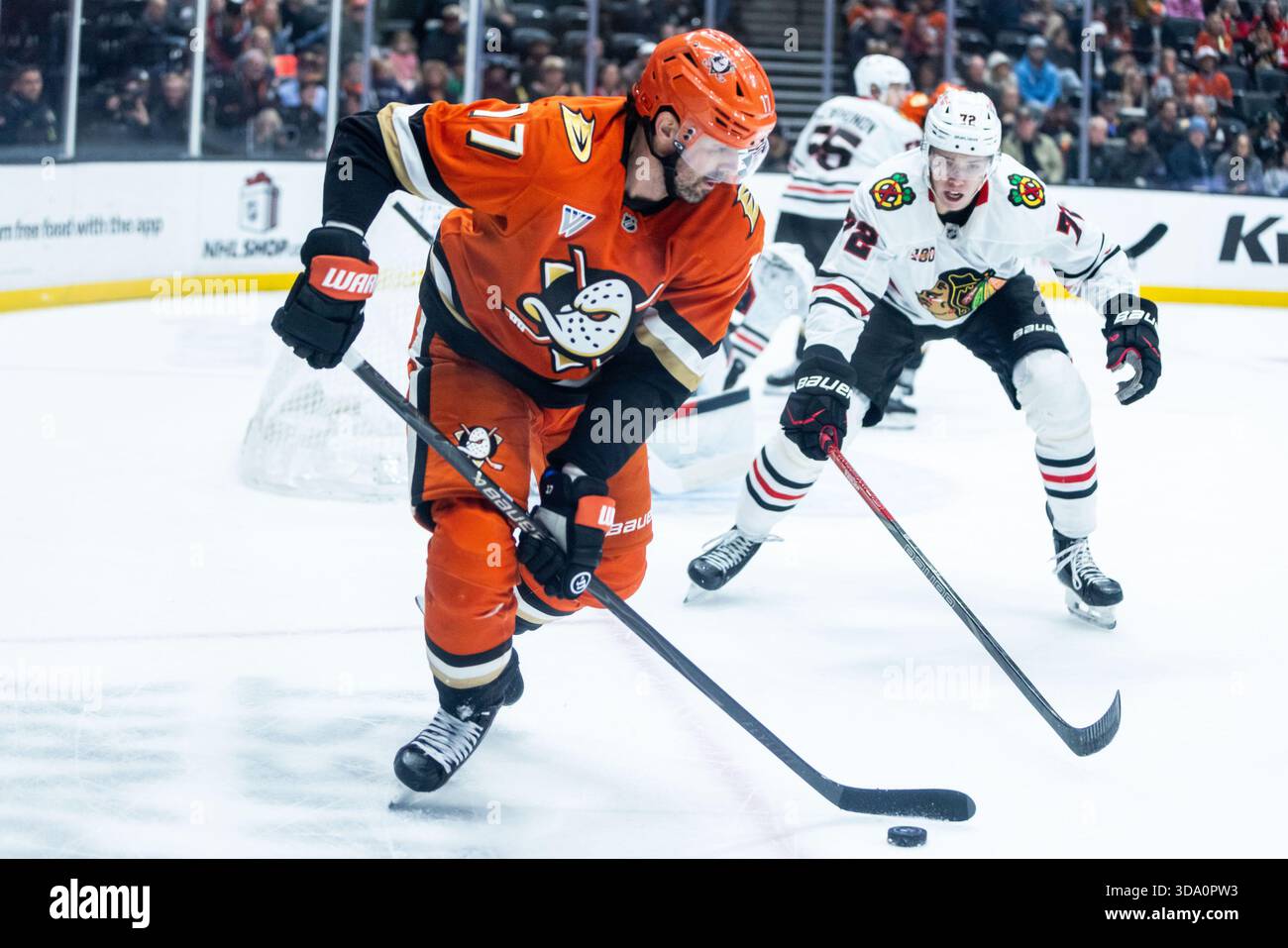 Anaheim Ducks left wing Alex Killorn (17) controls the puck while ...
