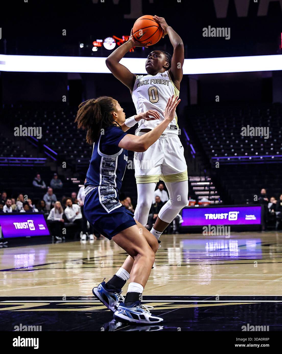 December 7, 2025: Wake Forest Guard Milan Brown (0) shoots over ...