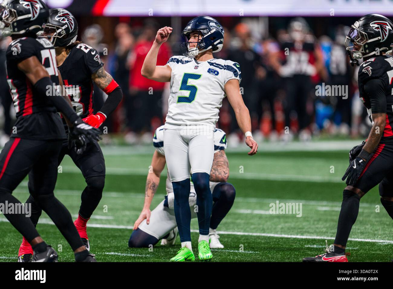 Seattle Seahawks place kicker Jason Myers (5) kicks an extra point ...