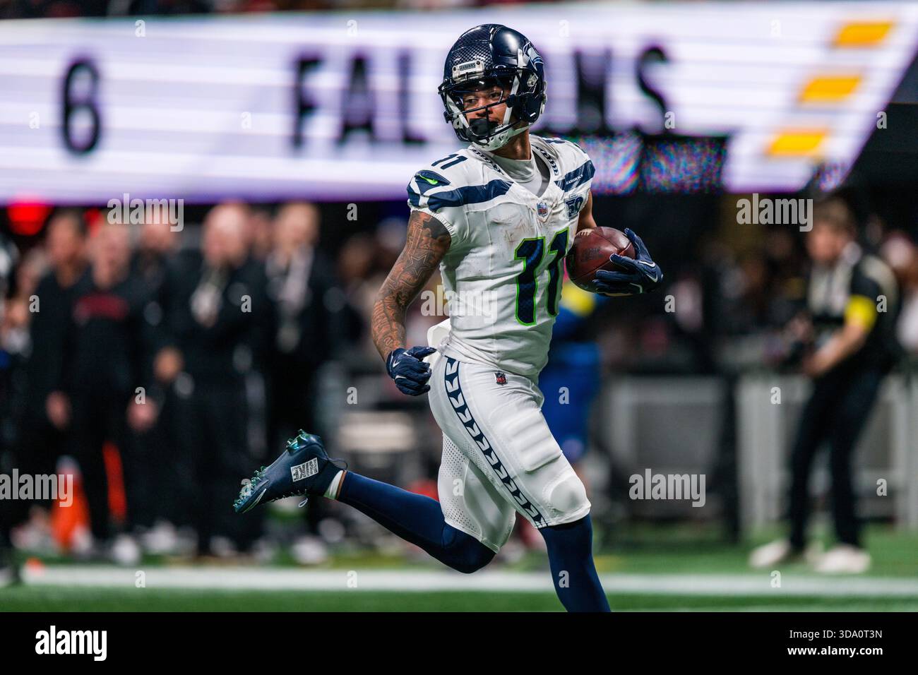 Seattle Seahawks wide receiver Jaxon Smith-Njigba (11) runs the ball ...