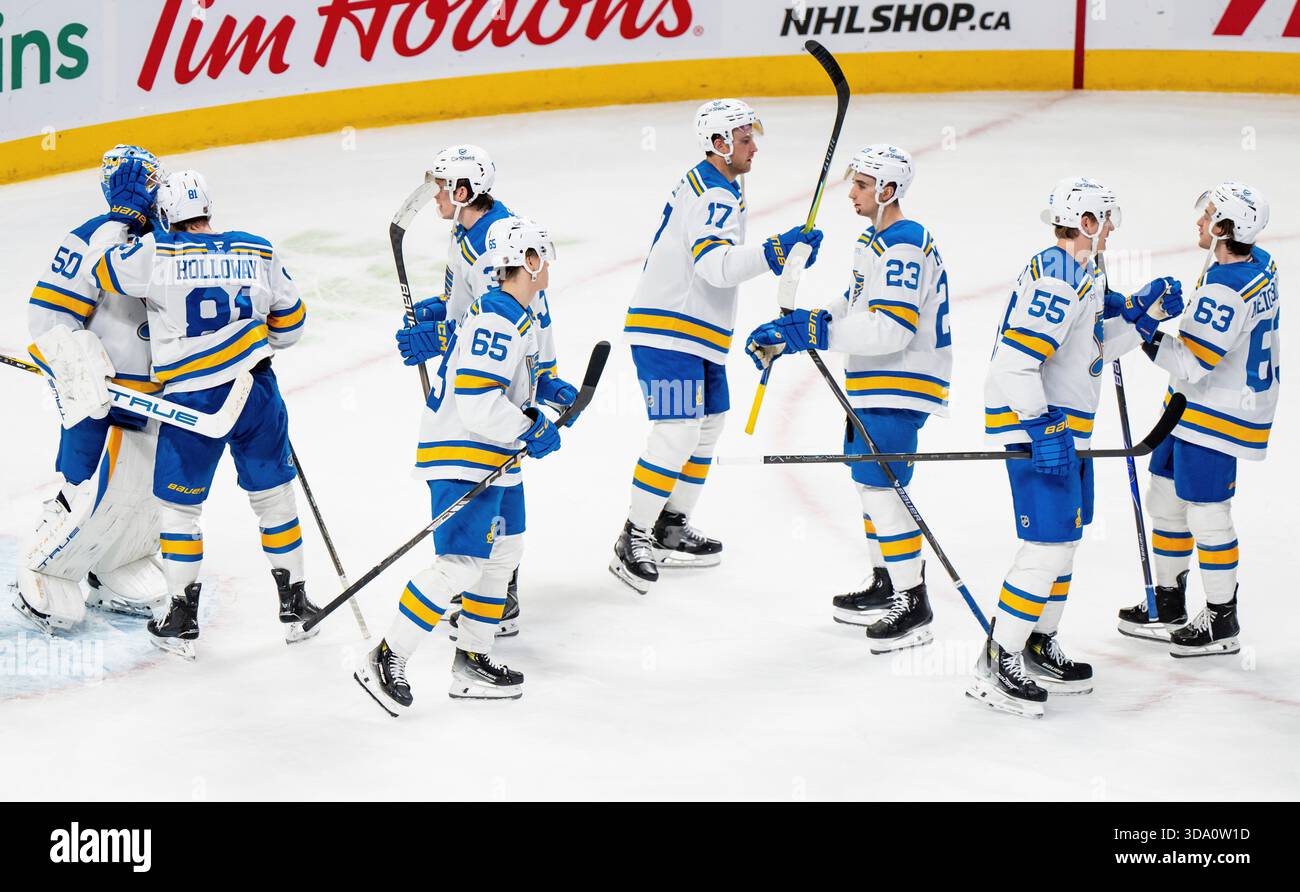 The St. Louis Blues celebrate after defeating the Montreal Canadiens in ...