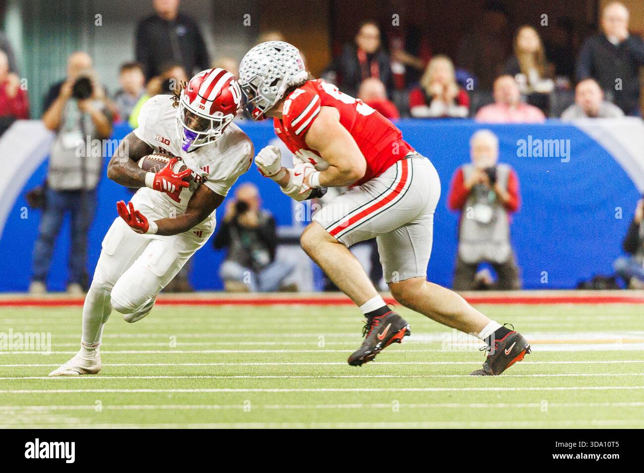 December 06, 2025: Indiana running back Roman Hemby (1) runs with the ...