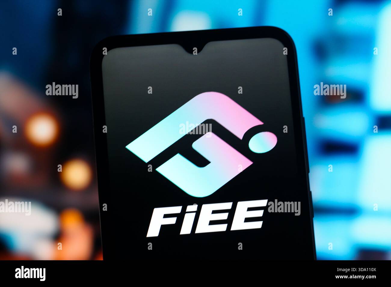 In this photo illustration, the FiEE logo is seen displayed on a ...