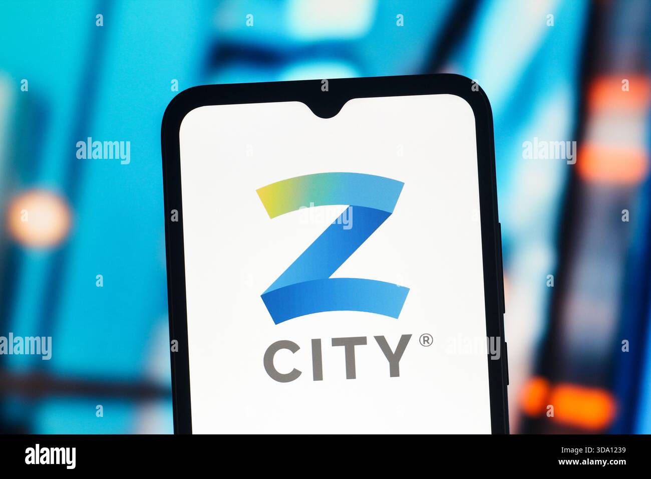 In this photo illustration, the ZCITY App logo is seen displayed on a ...