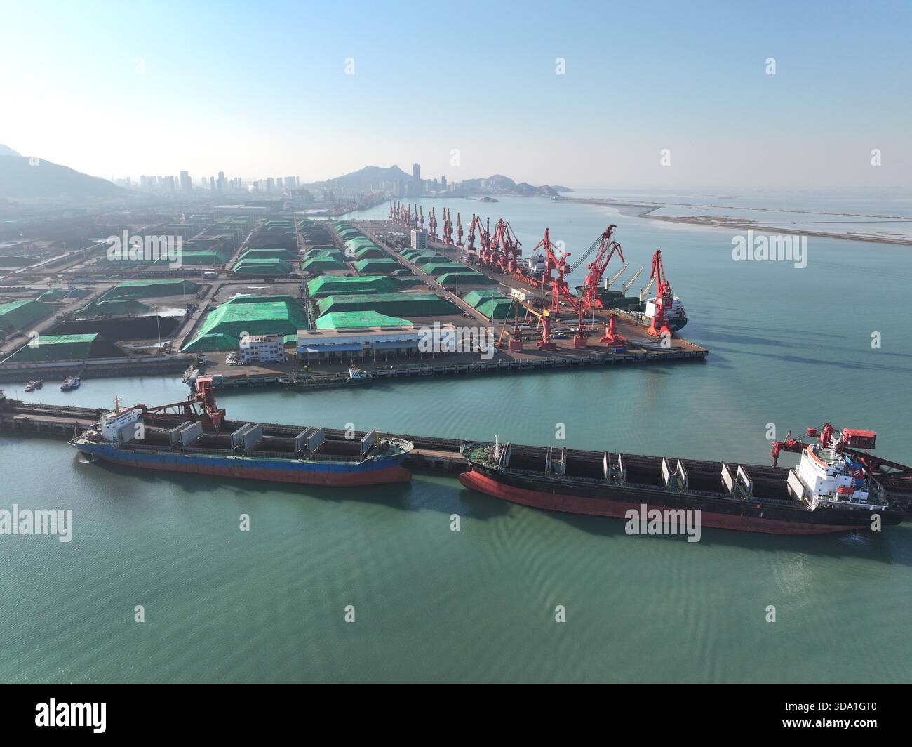 Aerial photo shows the ship unloading coals at Lianyungang Port in ...