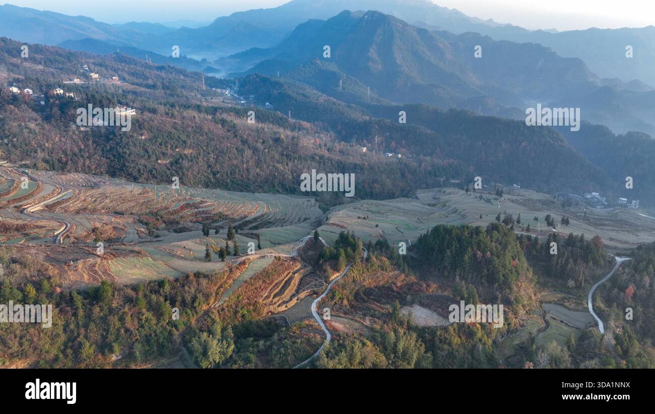 Aerial photo shows the winter scenery of terraced fields in Youyang ...