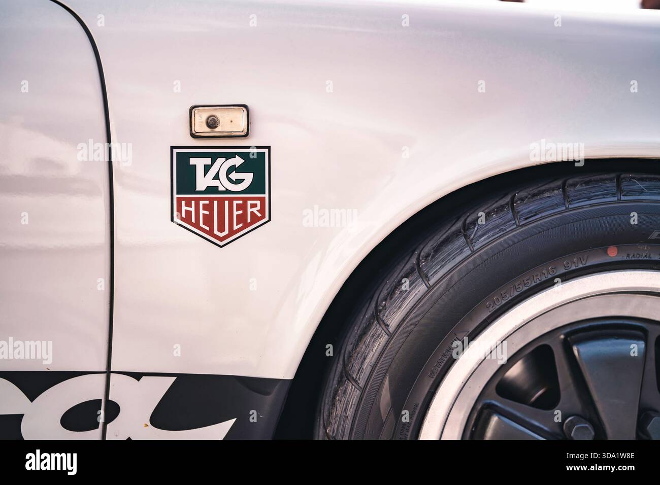 Vo, italy 28 october 2025: tag heuer shield emblem on a vintage white ...