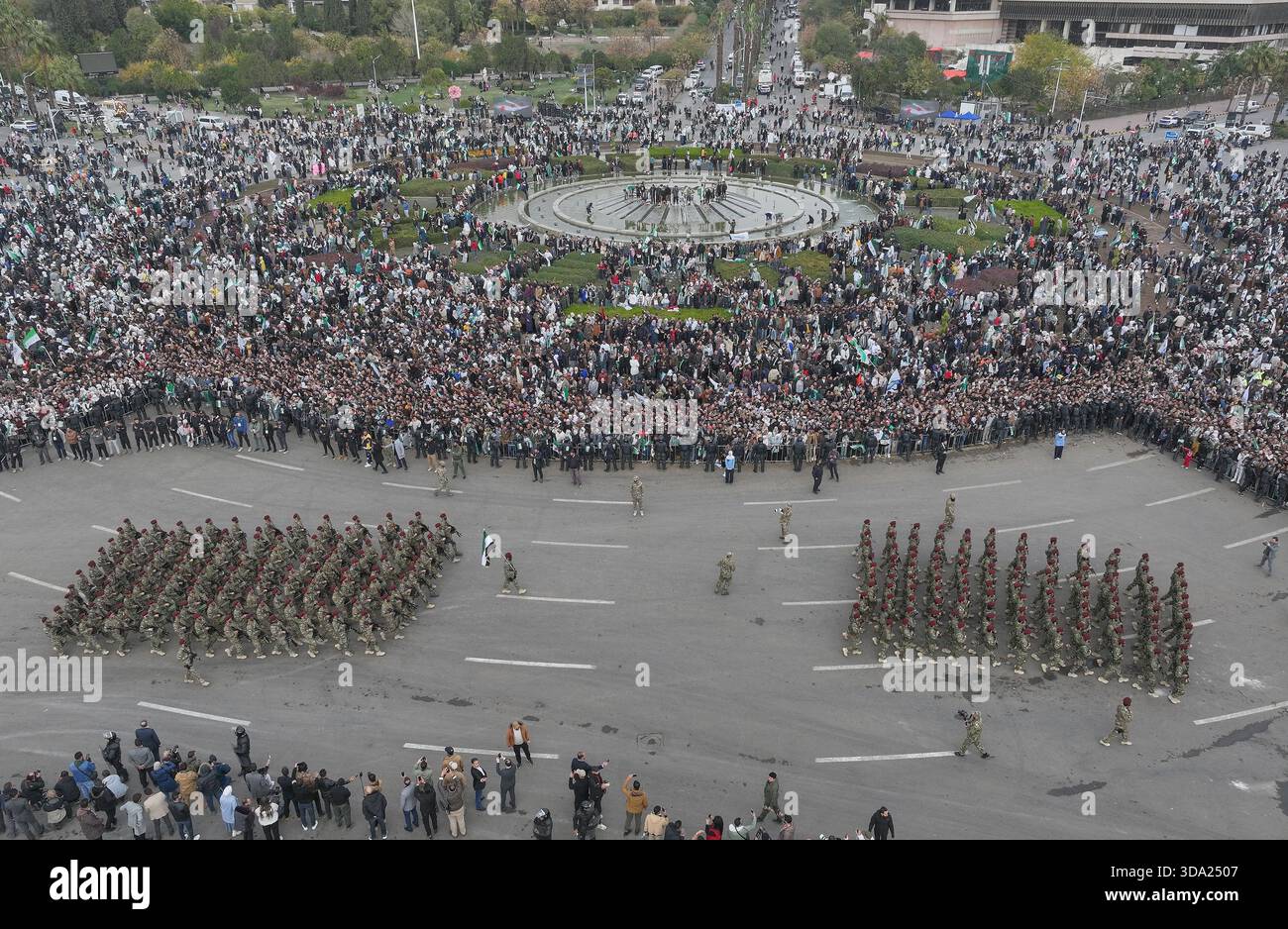 New Syrian army march during a parade marking the first anniversary of ...