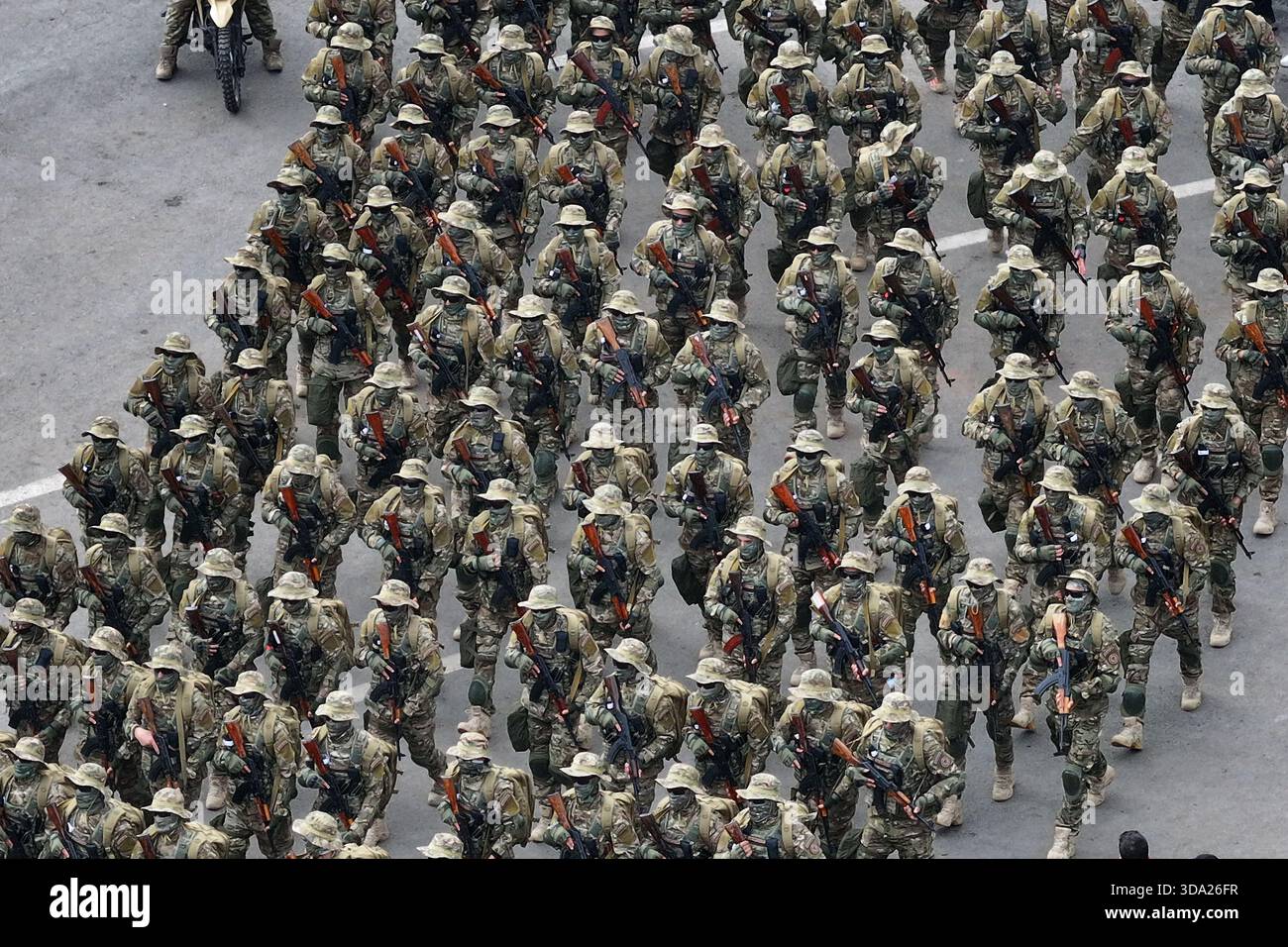 New Syrian army march during a parade marking the first anniversary of ...