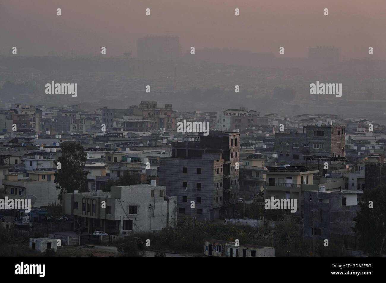 A thin layer of air pollution reduce visibility on the outskirts of ...