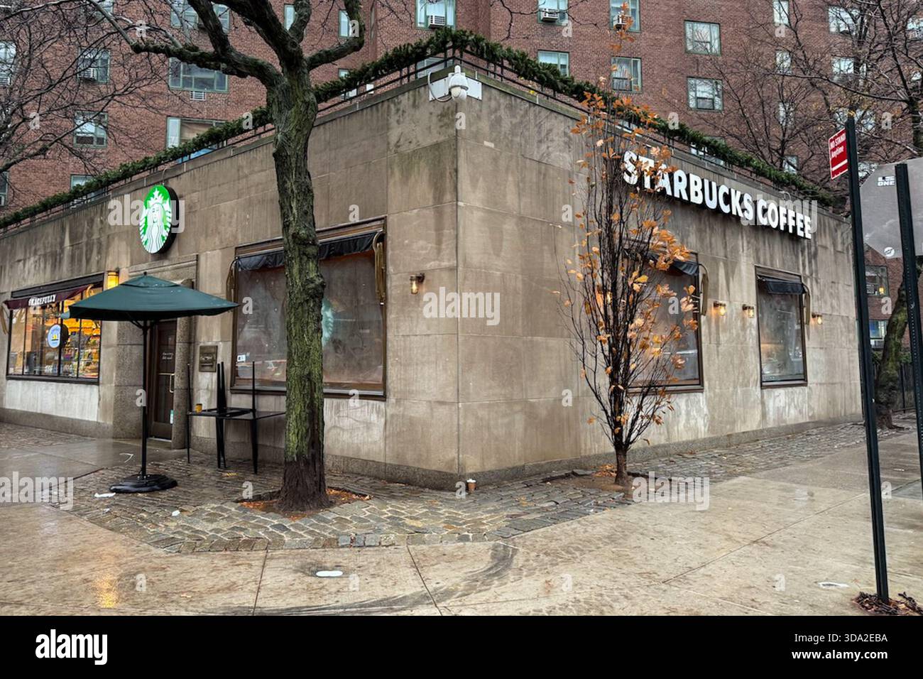 A sign outside a Starbucks location in Manhattan promotes Eggnog Latte ...