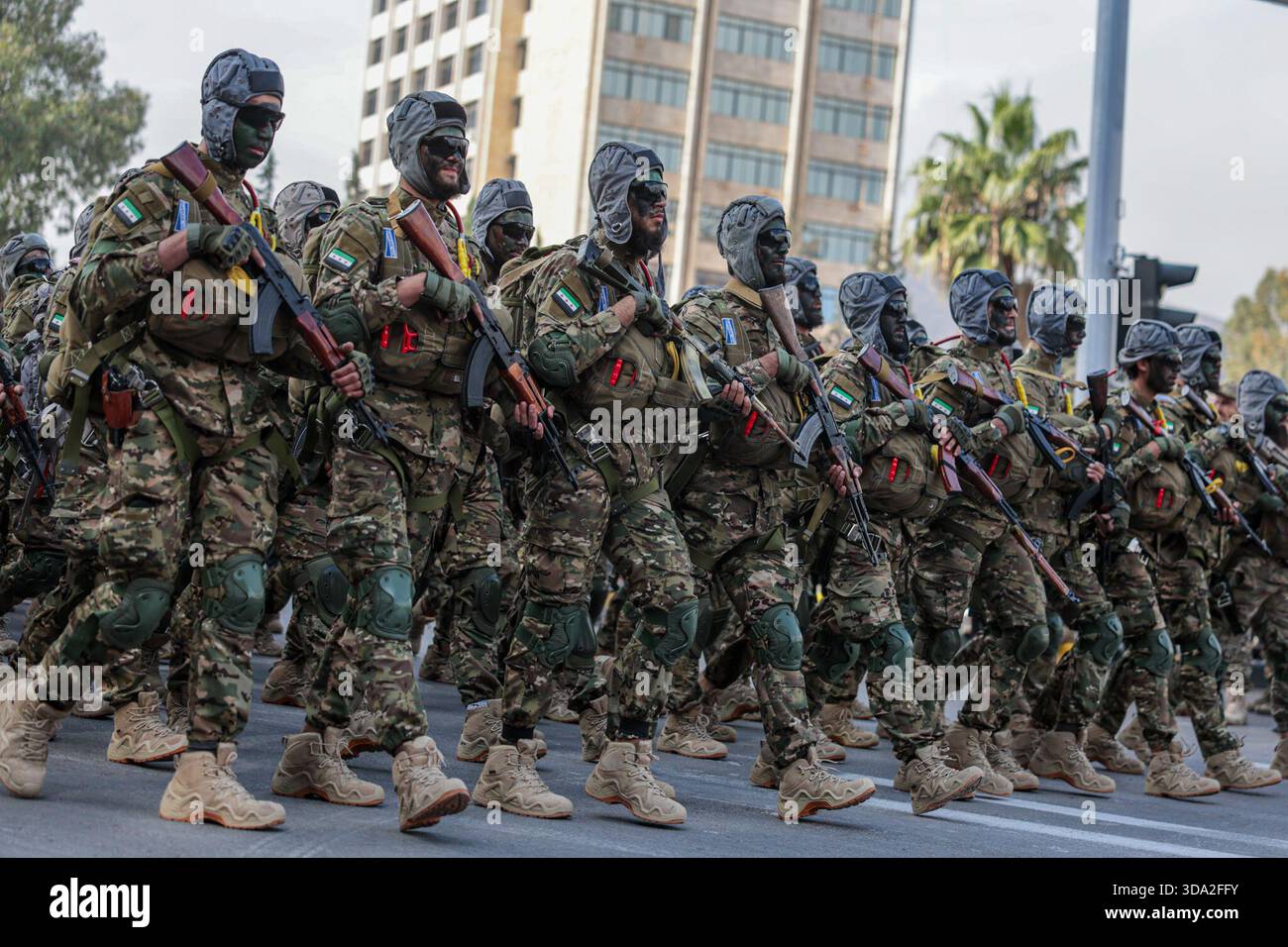 08 December 2025, Syria, Damascus: Officers participate in the military ...