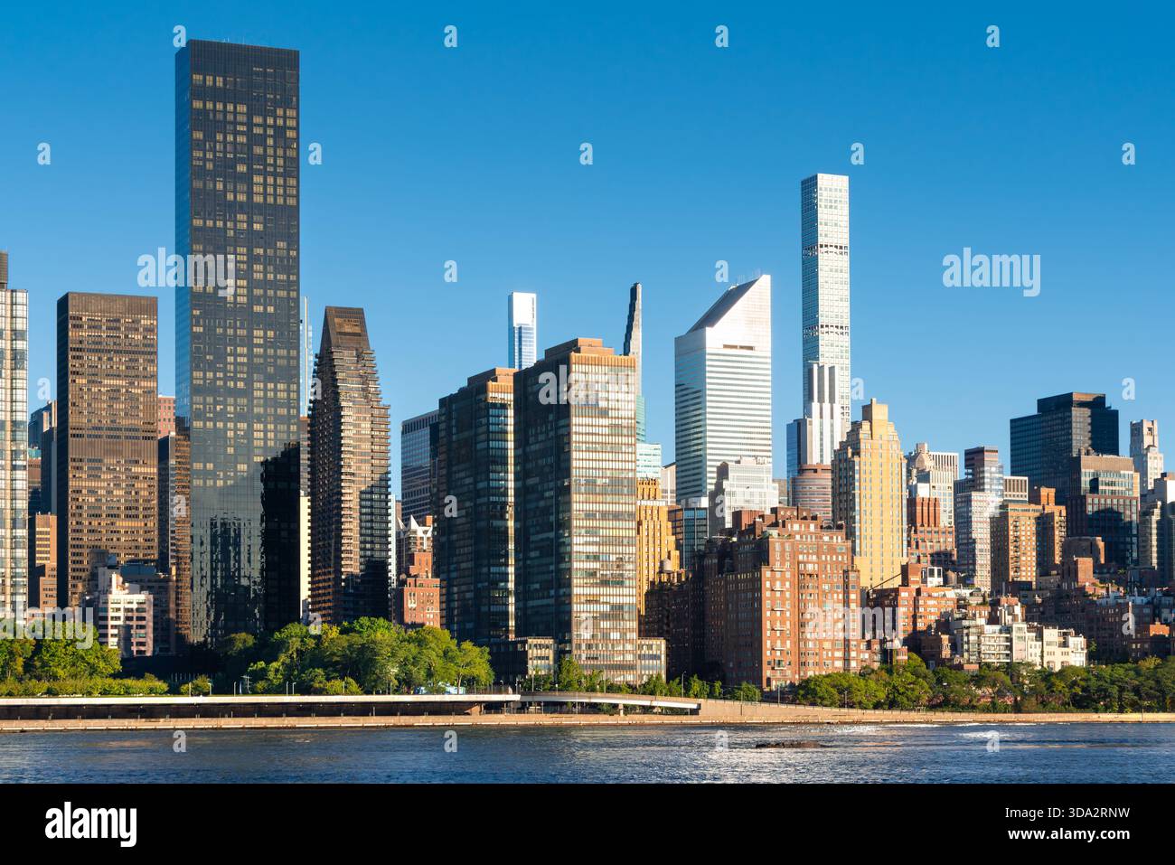 Midtown East Manhattan skyline seen across the East River, with modern ...