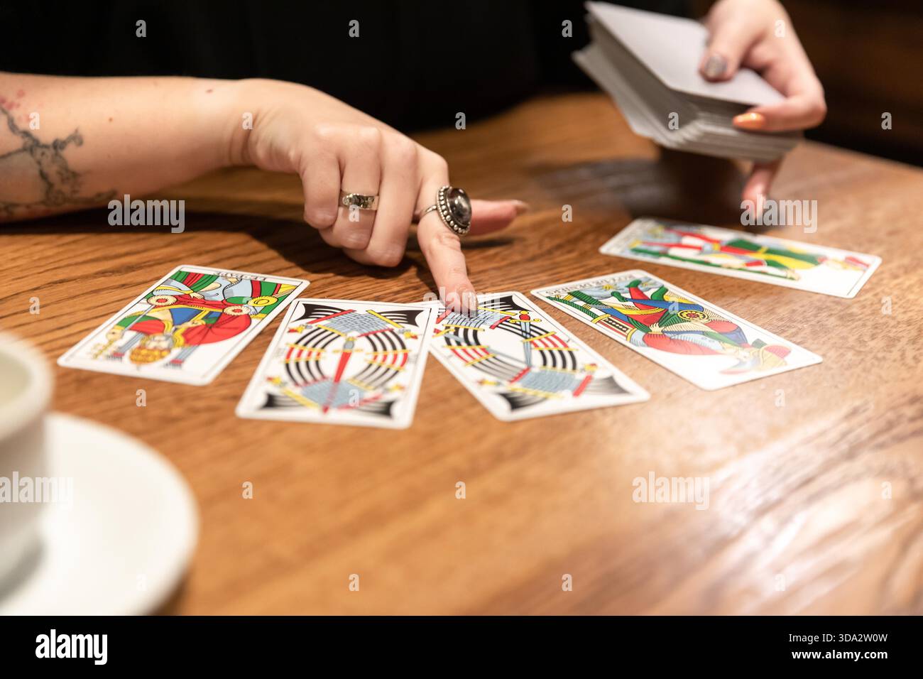 Tarot cards and fortune telling. Soothsayer predicting future with ...