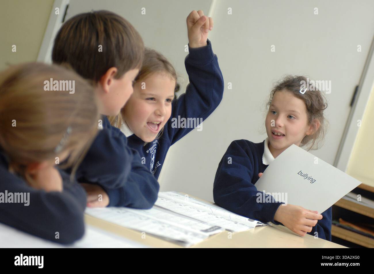 primary school children reading and learning from each other Stock ...