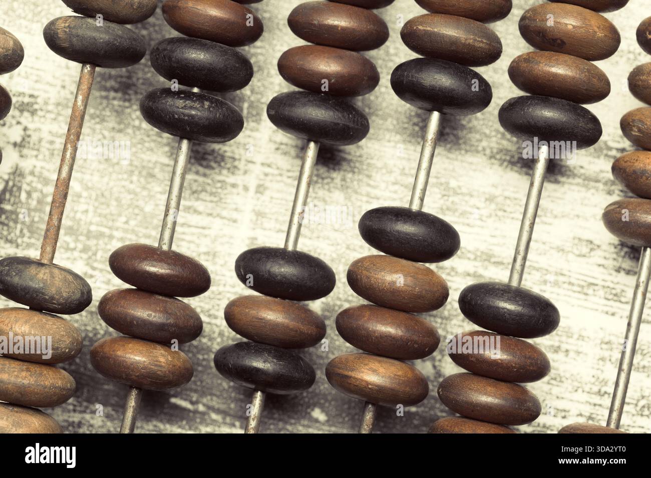 Colorful wooden beads arranged on a traditional counting frame for ...