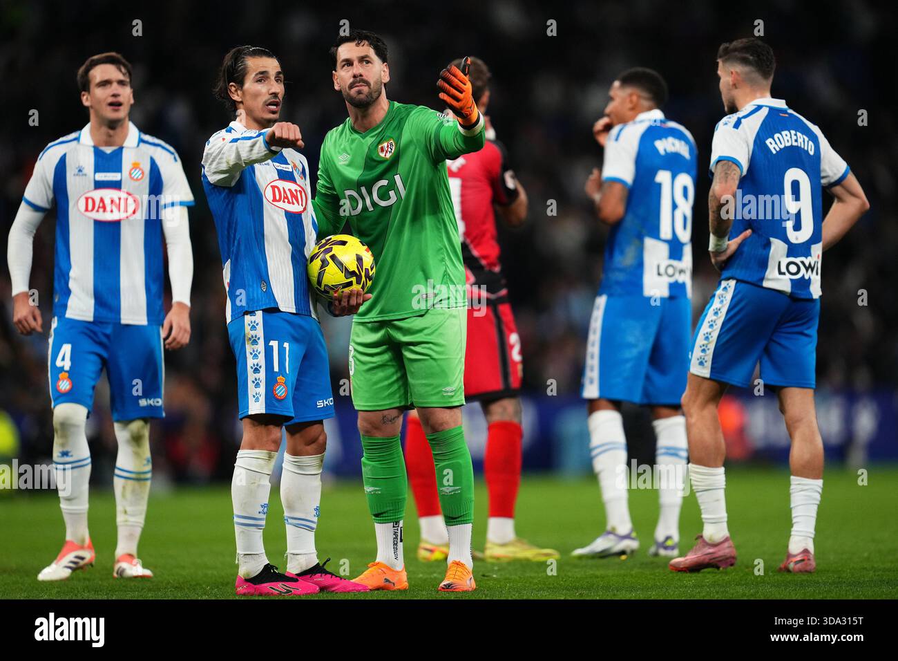 Augusto Batalla of Rayo Vallecano and Pere Milla of RCD Espanyol during ...