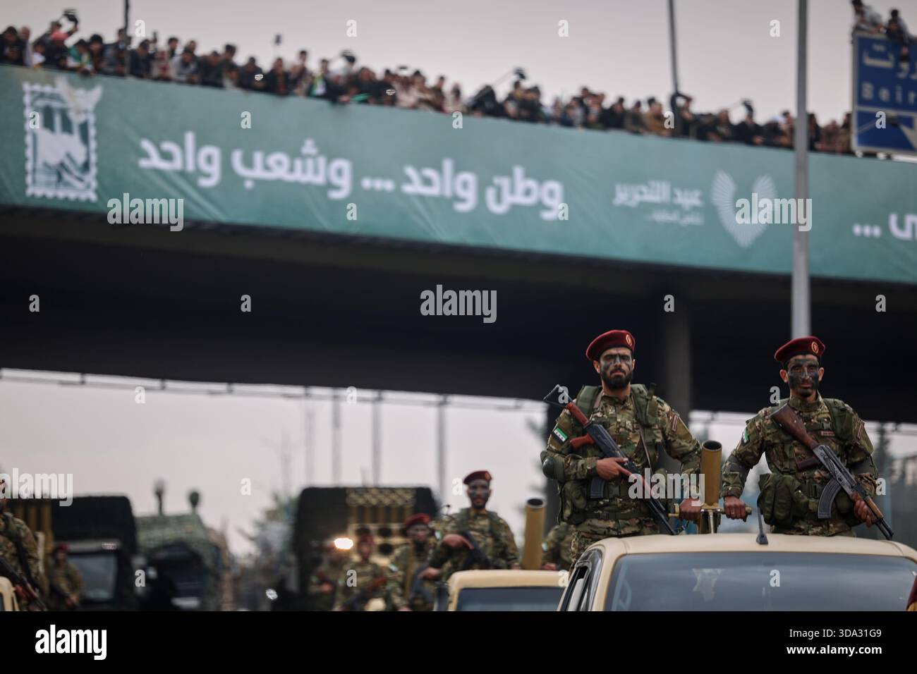 New Syrian army soldiers march during a parade marking the first ...