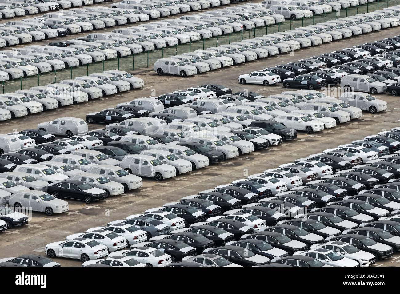 Aerial view of new cars waiting for shipment in the port in Nanjing in ...