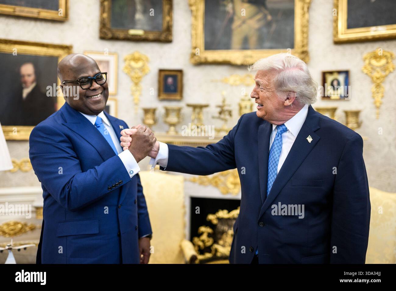 President Donald Trump greets President Felix Tshisekedi of the ...