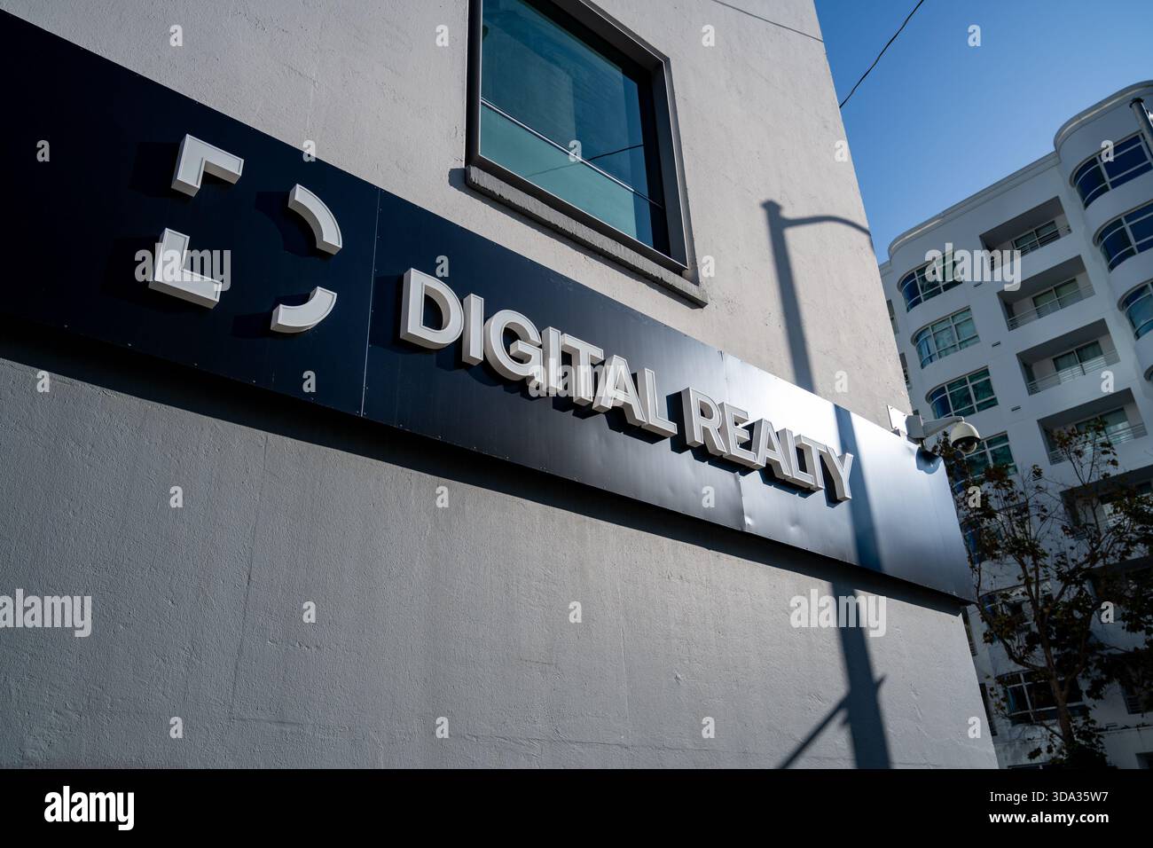 Digital Realty data center exterior with company logo sign on sunny day ...
