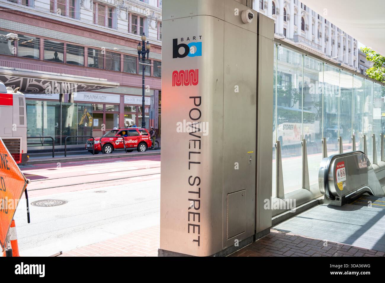 Entrance to Powell Street BART and Muni station with escalator and ...