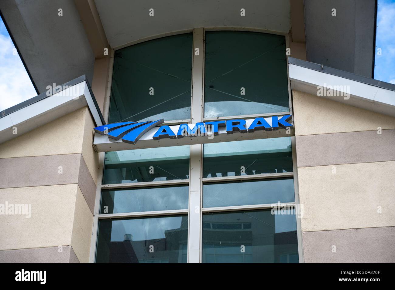 Low-angle view of Amtrak logo on station building, Emeryville ...