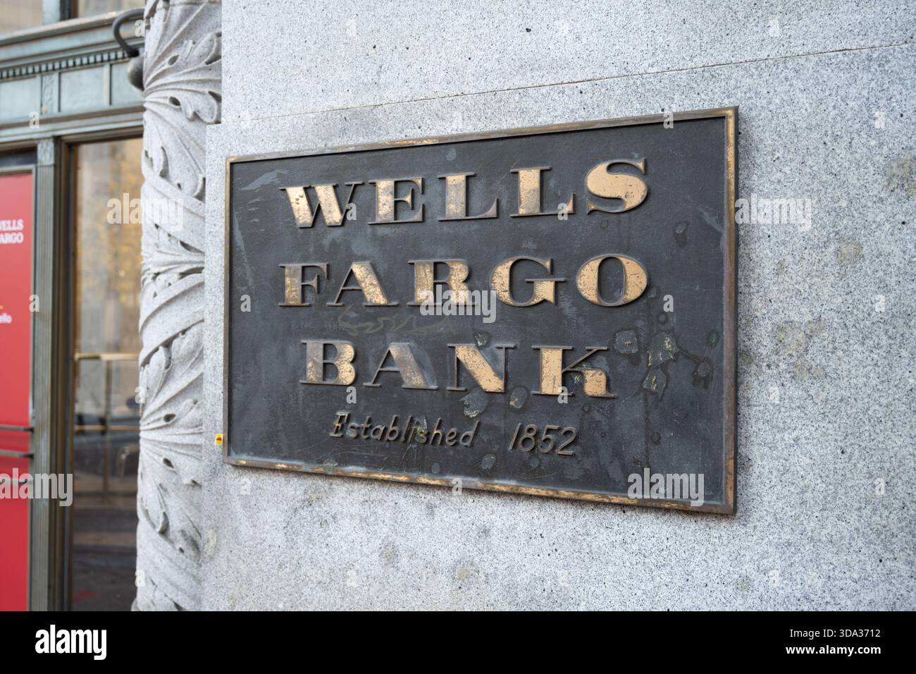 Historic Wells Fargo Bank plaque mounted on stone exterior wall of ...