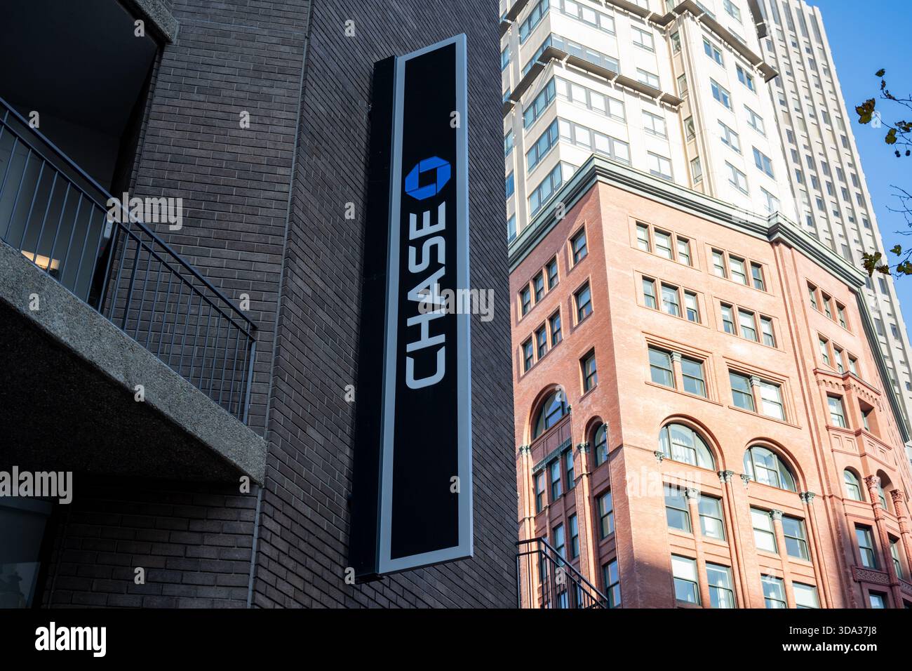 Vertical Chase bank sign on brick building with historic downtown ...