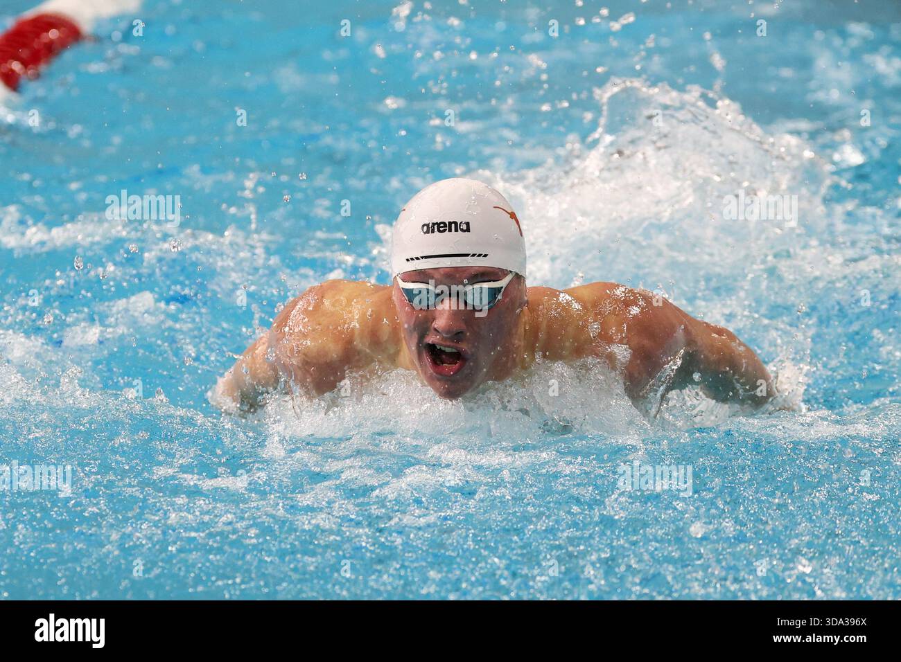 AUSTIN, TX - DECEMBER 05: Kyle Peck competes in a men's 100 meter ...