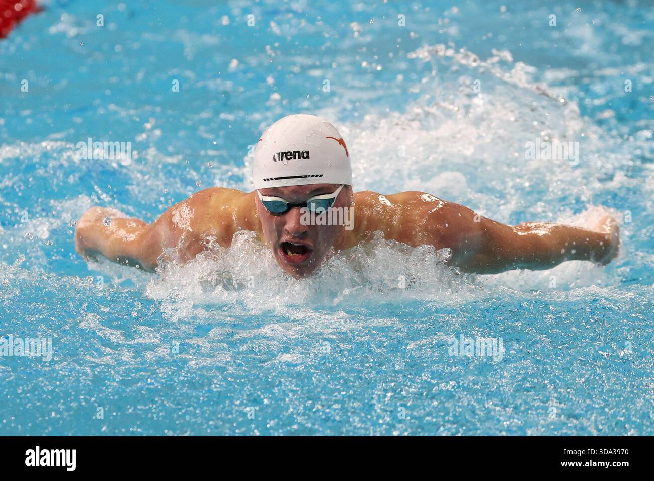 AUSTIN, TX - DECEMBER 05: Kyle Peck competes in a men's 100 meter ...