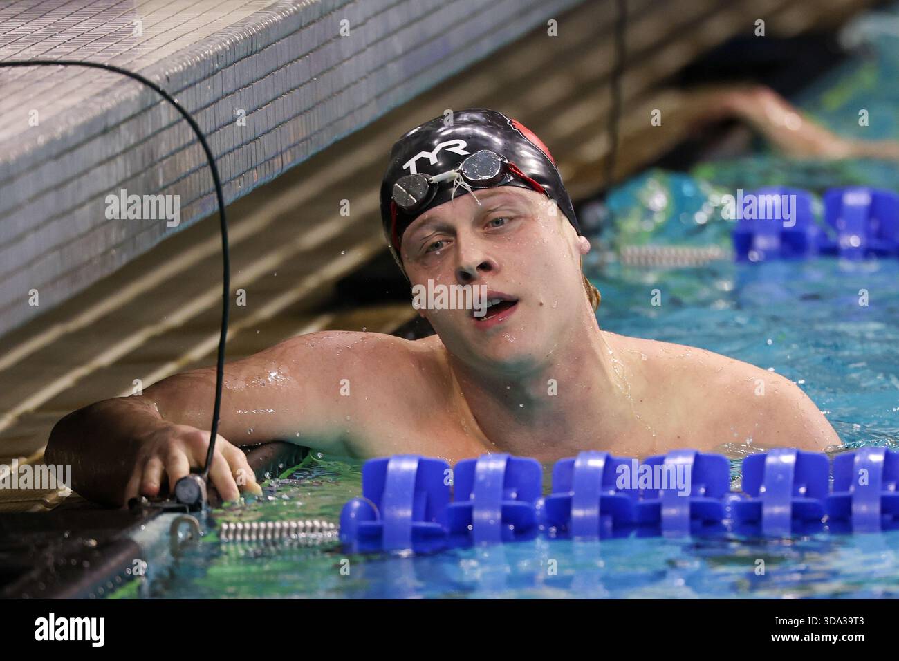 AUSTIN, TX - DECEMBER 05: Tommy Bried in the pool after a men's 400 ...