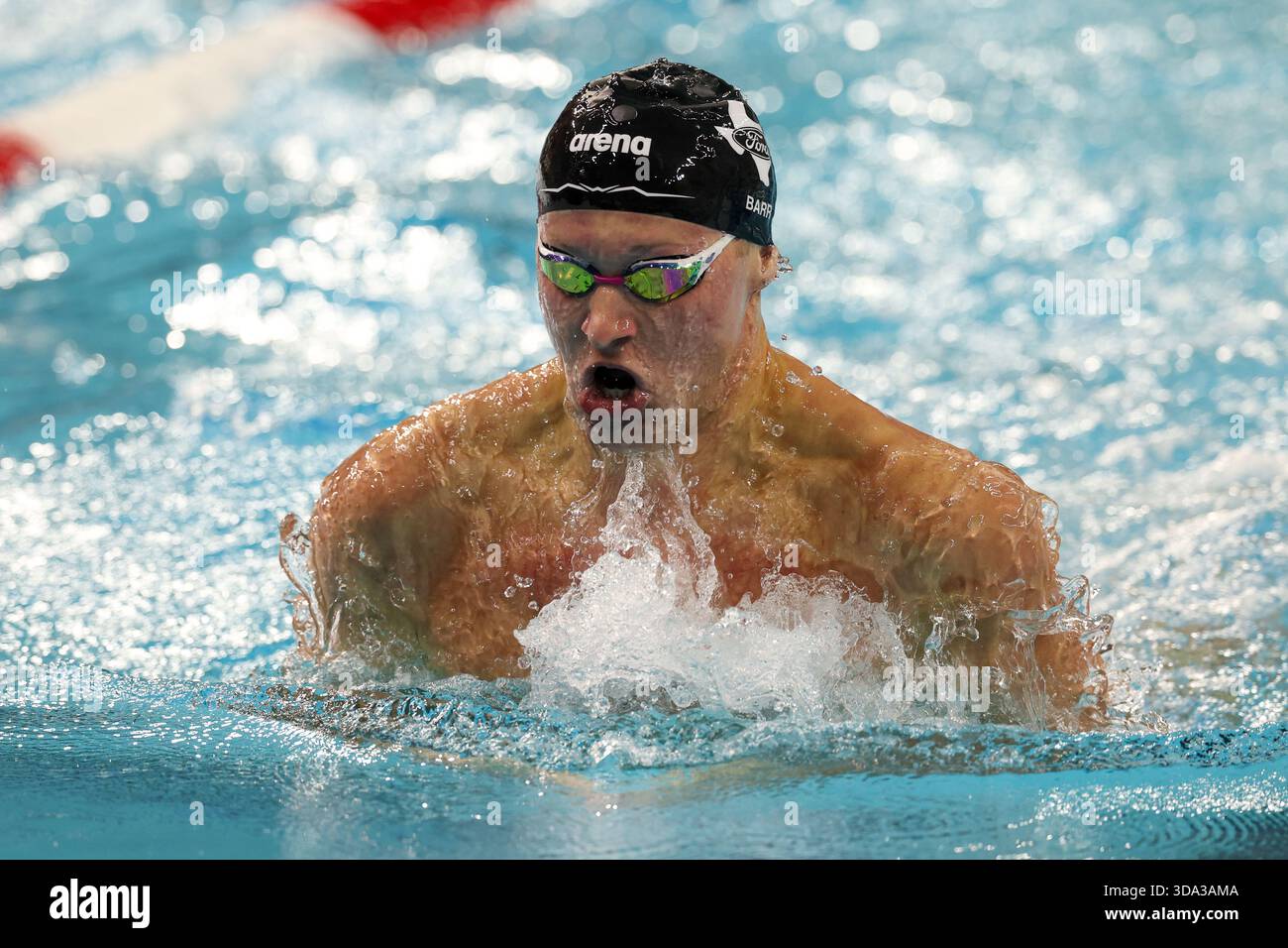 AUSTIN, TX - DECEMBER 05: Luke Barr competes in a men's 100 meter ...
