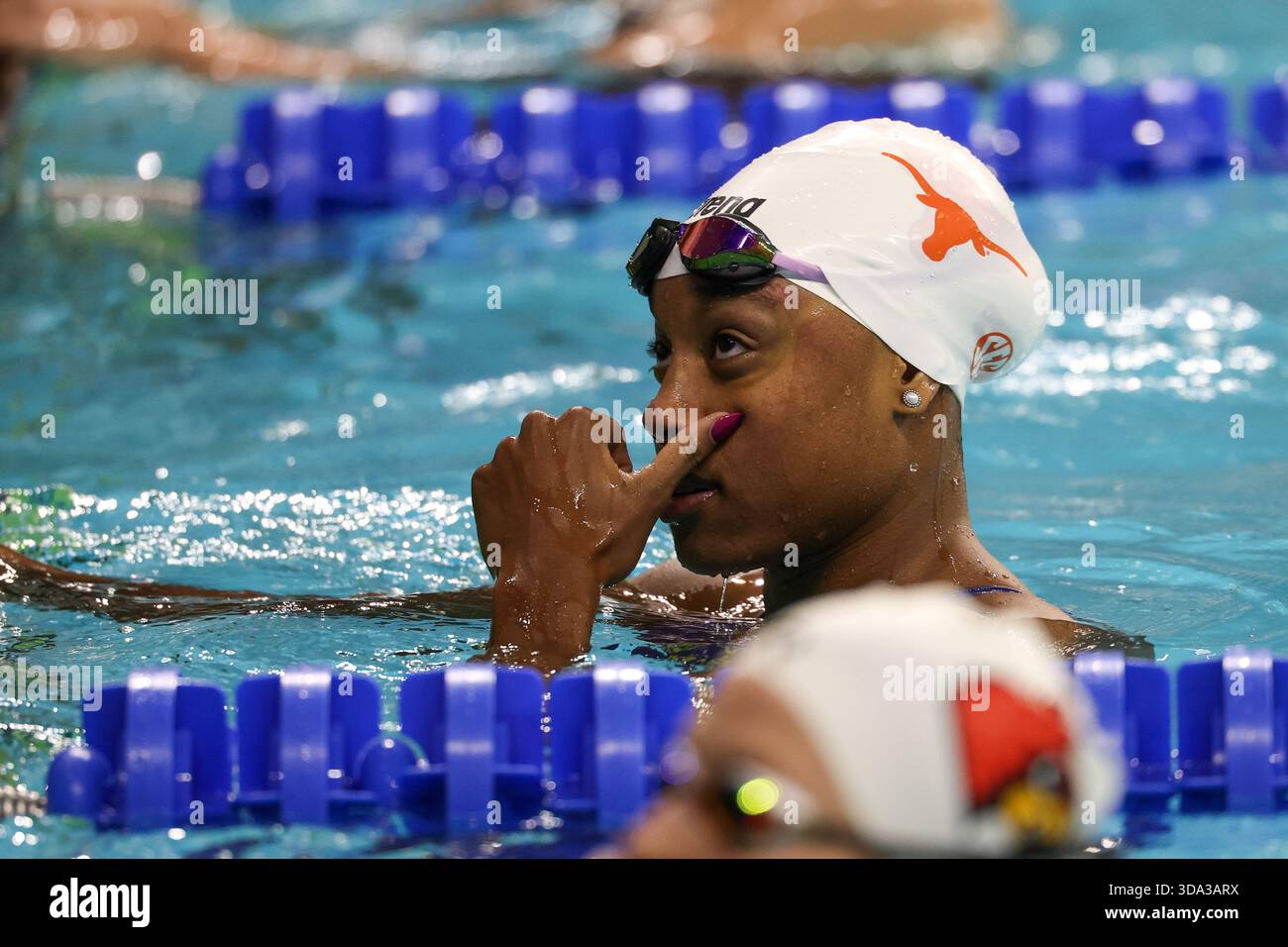 AUSTIN, TX - DECEMBER 05: Simone Manuel in the pool after a women's 200 ...
