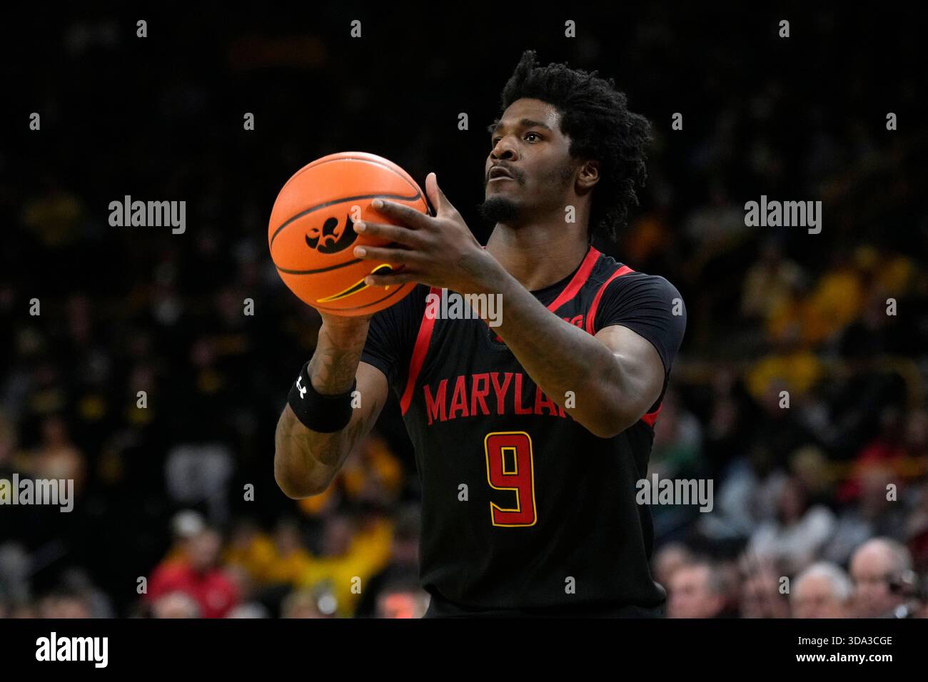 Maryland forward Solomon Washington shoots during the first half of an ...
