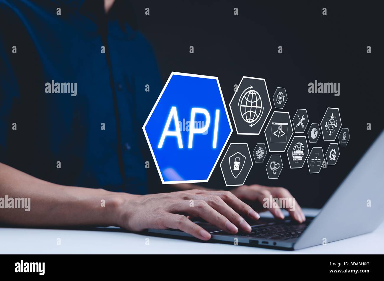 API - Application Programming Interface Concept. A programmer types on ...