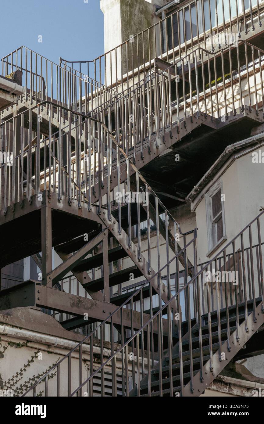 Metal stairs on the back of building Stock Photo - Alamy